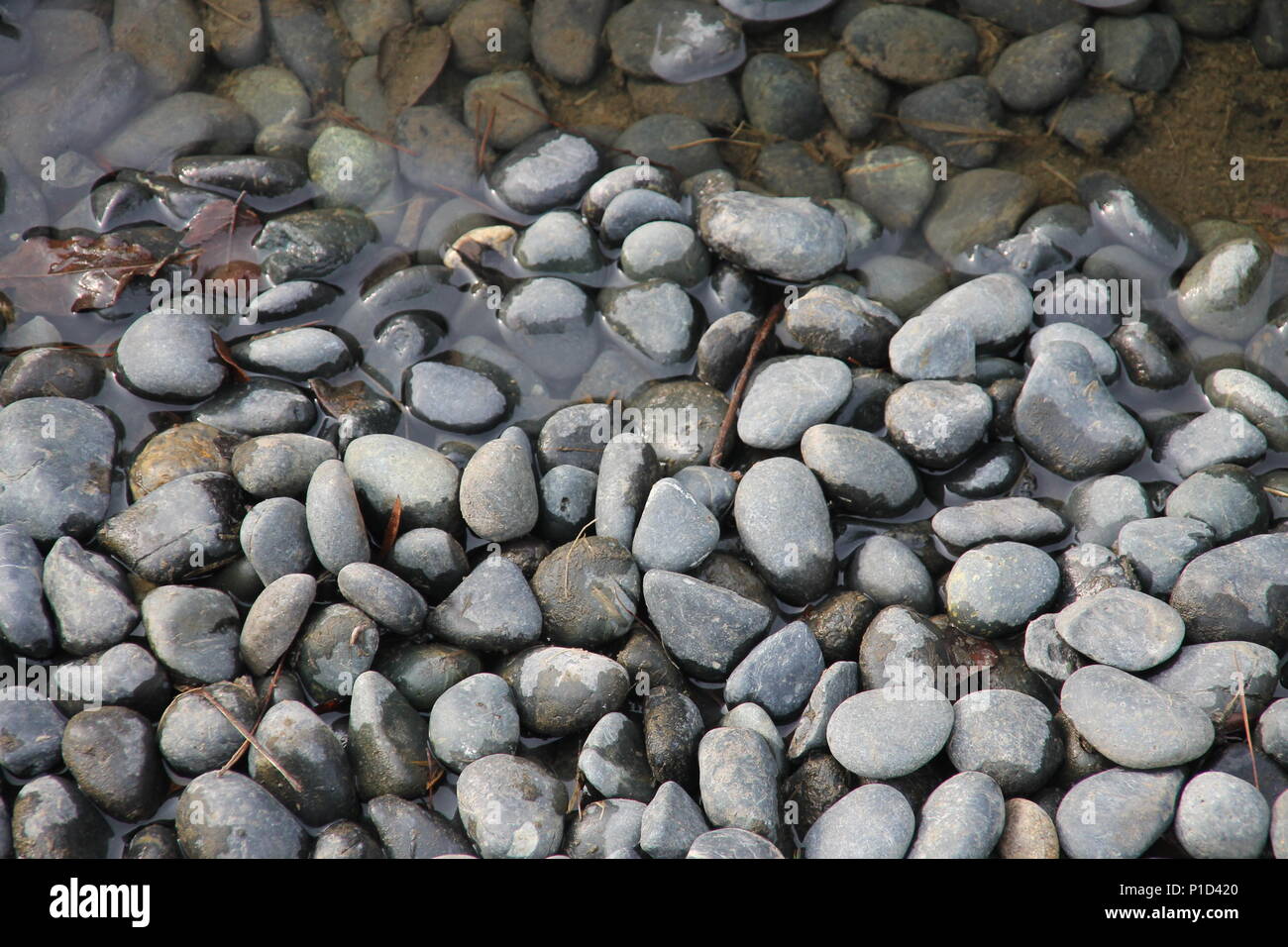 Water Splash on Stones Wallpaper Stock Photo - Alamy