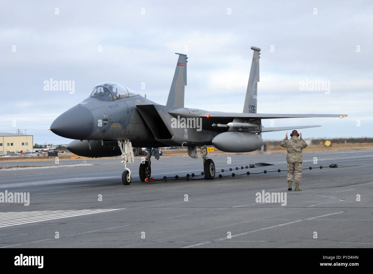 Master Sgt. Dustin Brice, 142nd Maintenance Group, marshals the F-15 ...