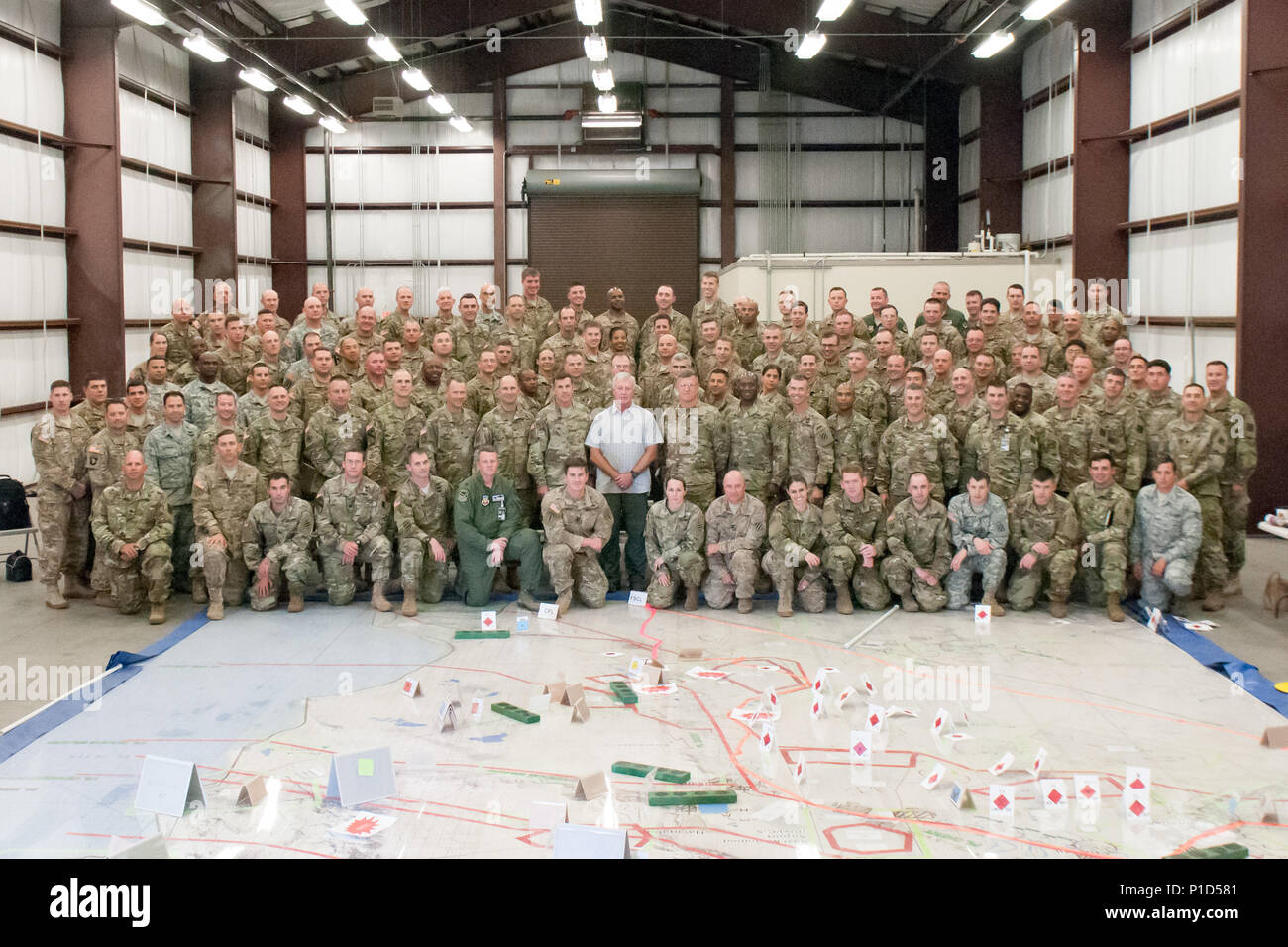 The 3ID command staff poses for a group photo after conducting the ...