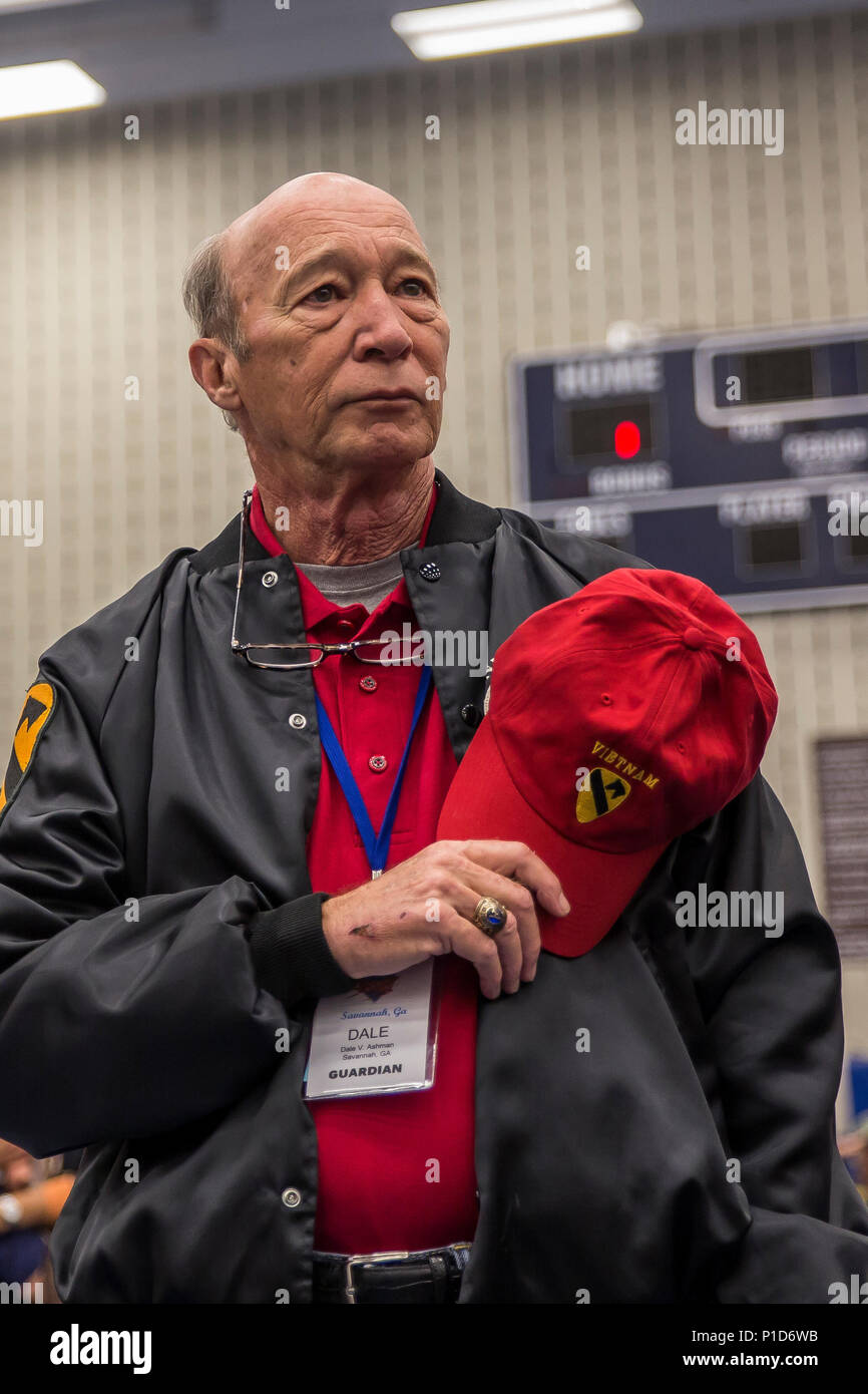 Dale Ashman, a Vietnam War veteran, stands for the playing of the ...