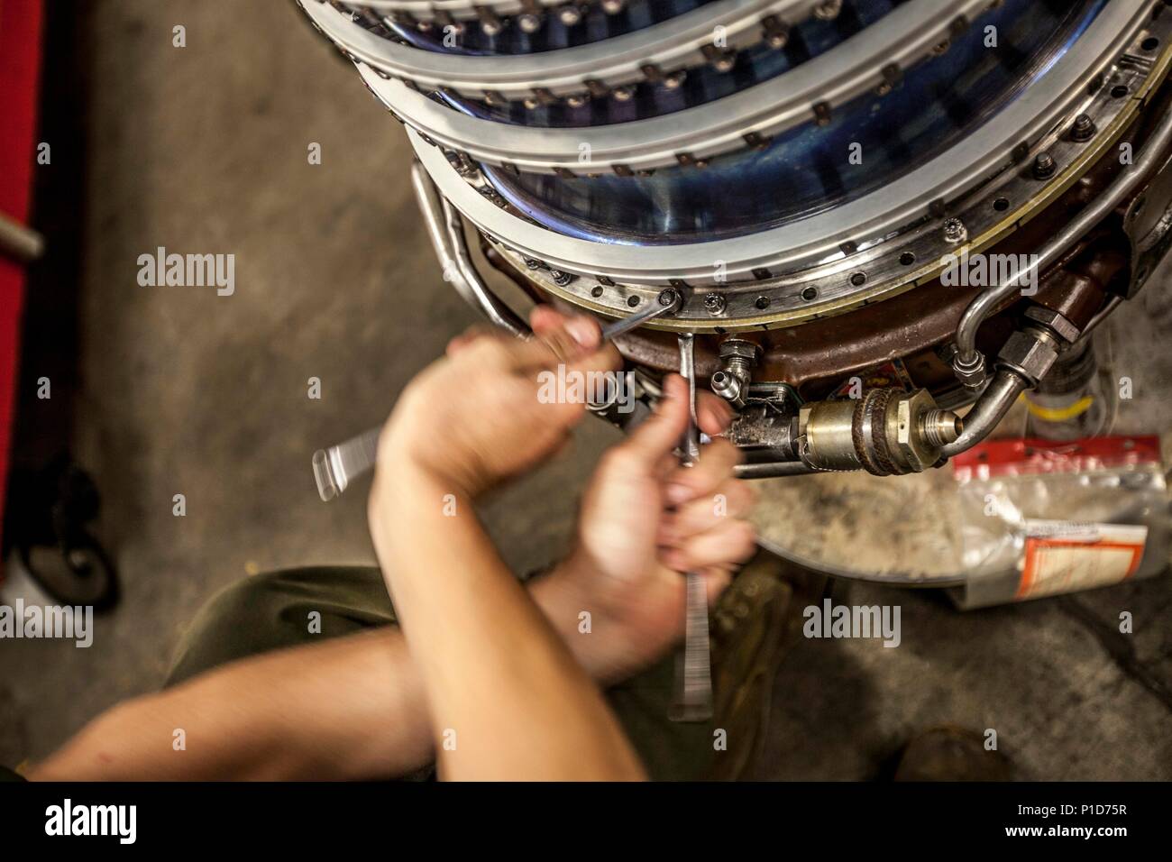 A U.S. Marines Corps helicopter power plant mechanic assigned to Marine ...