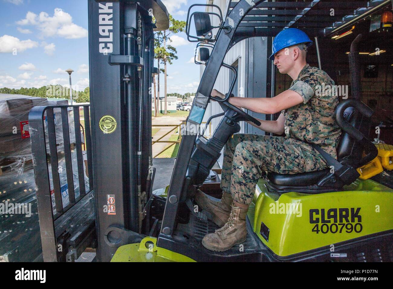 A U.S. Marine warehouse clerk assigned to Marine Aviation Logistics ...