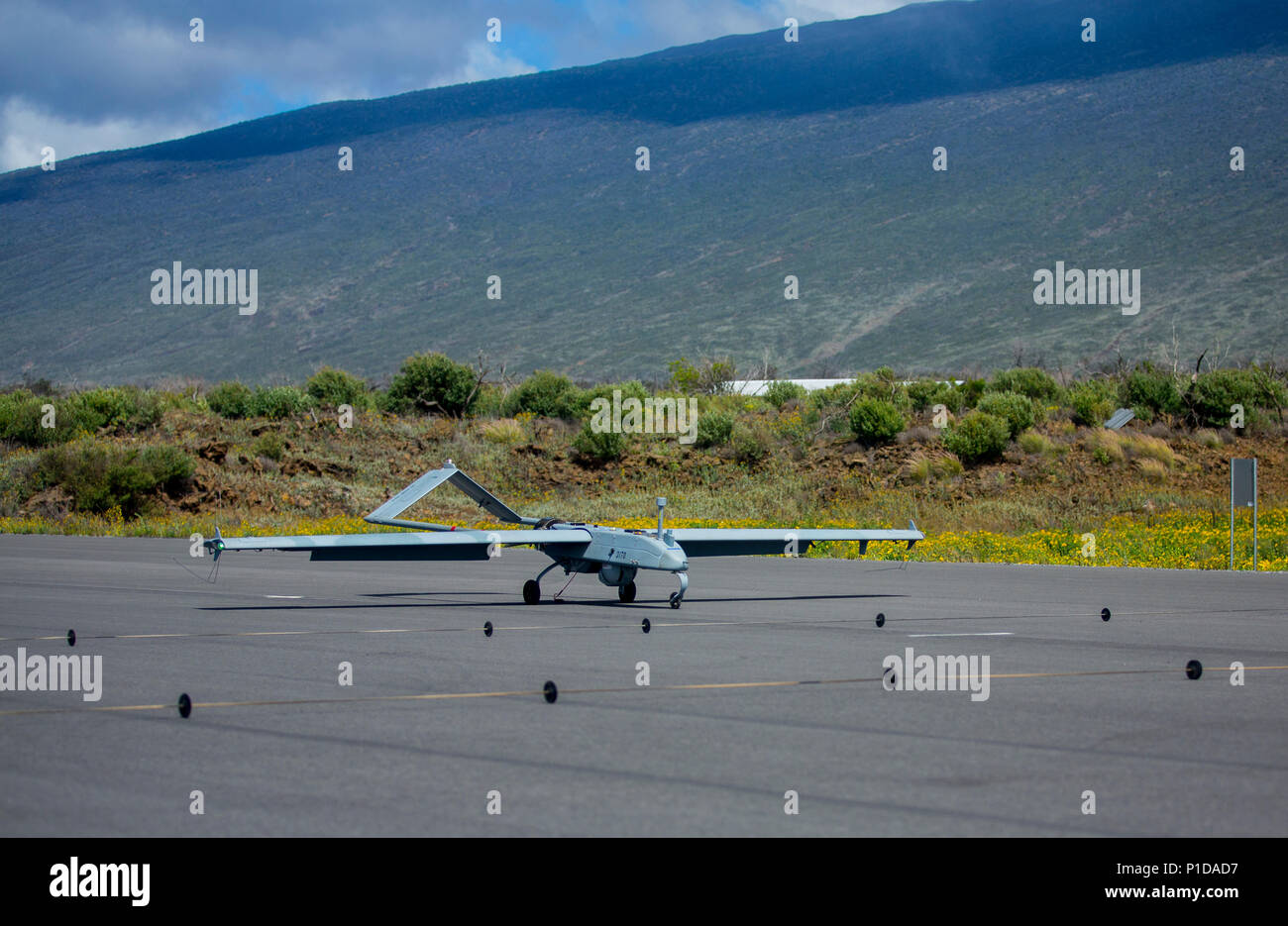 After completing a reconnaissance mission, the RQ-7B v2 Shadow UAV from ...