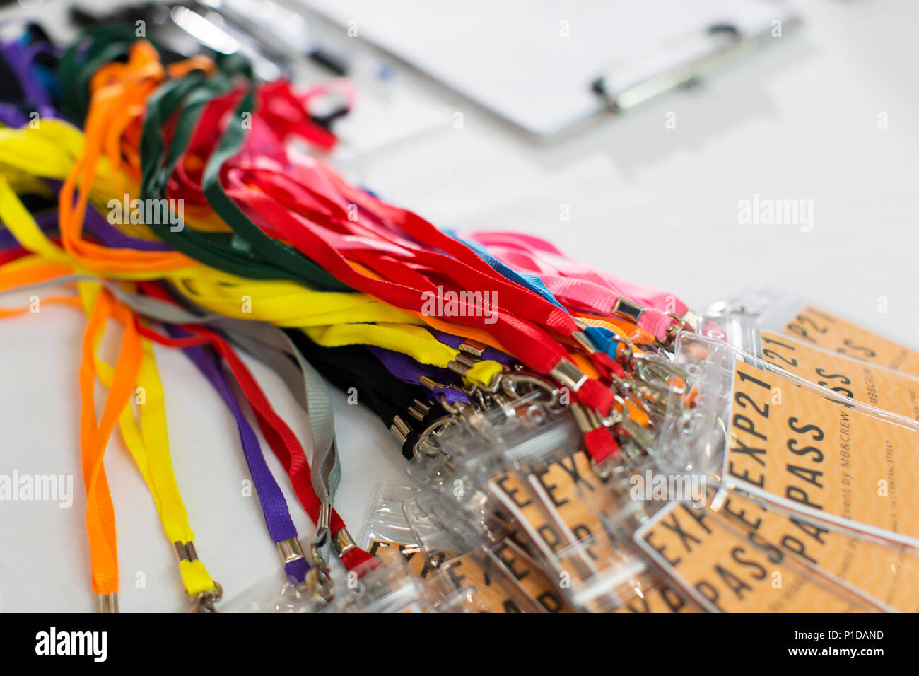 Multicolor conference pass lanyards Stock Photo - Alamy