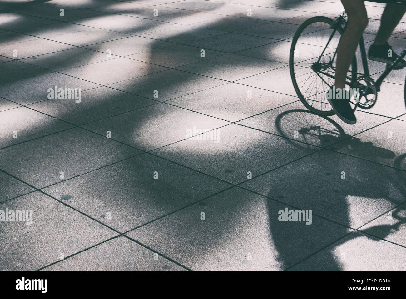 High Angle View of Tiled Walkway with Light and Shadow Pattern and ...