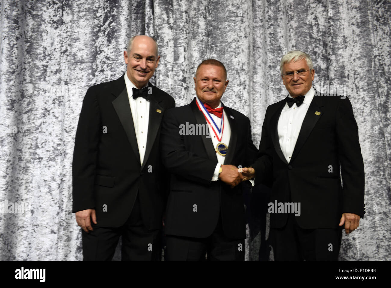 J.D. Crouch, CEO and president, USO; Ron Meier, USO Volunteer of the ...