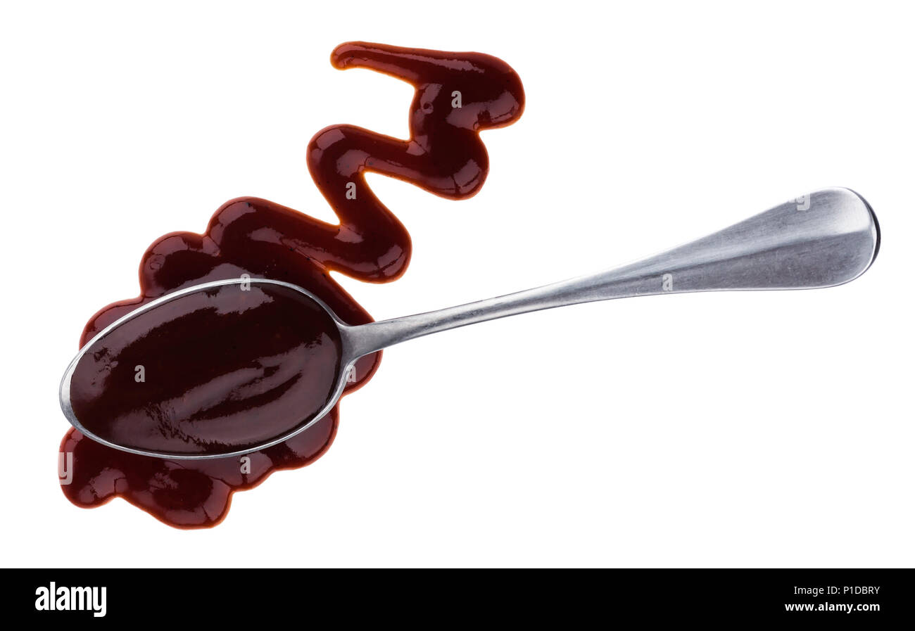Barbecue sauce. Splashes and spilled grill sauce with spoon isolated on ...