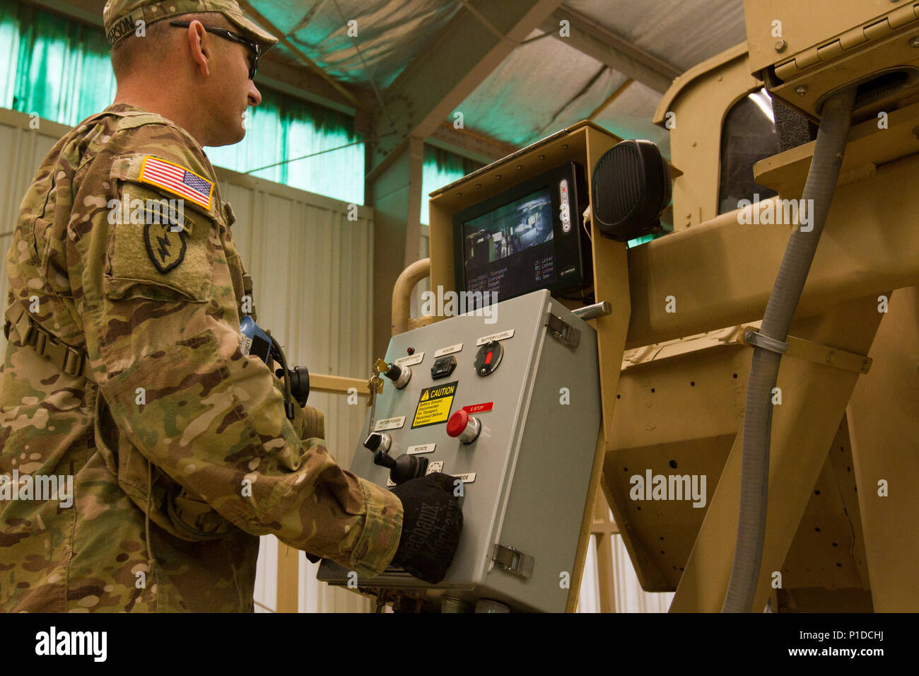 Sgt. 1st Class Donald Masterson, an observer coach trainer of Grizzly ...