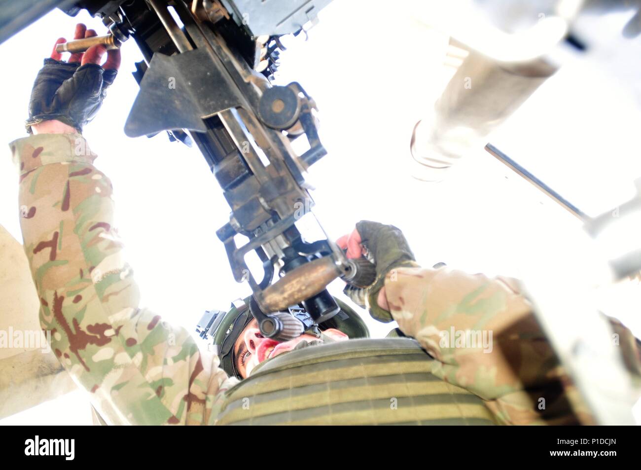 A Ukrainian gunner from the 1-80th Airmobile Brigade clears spent brass ...
