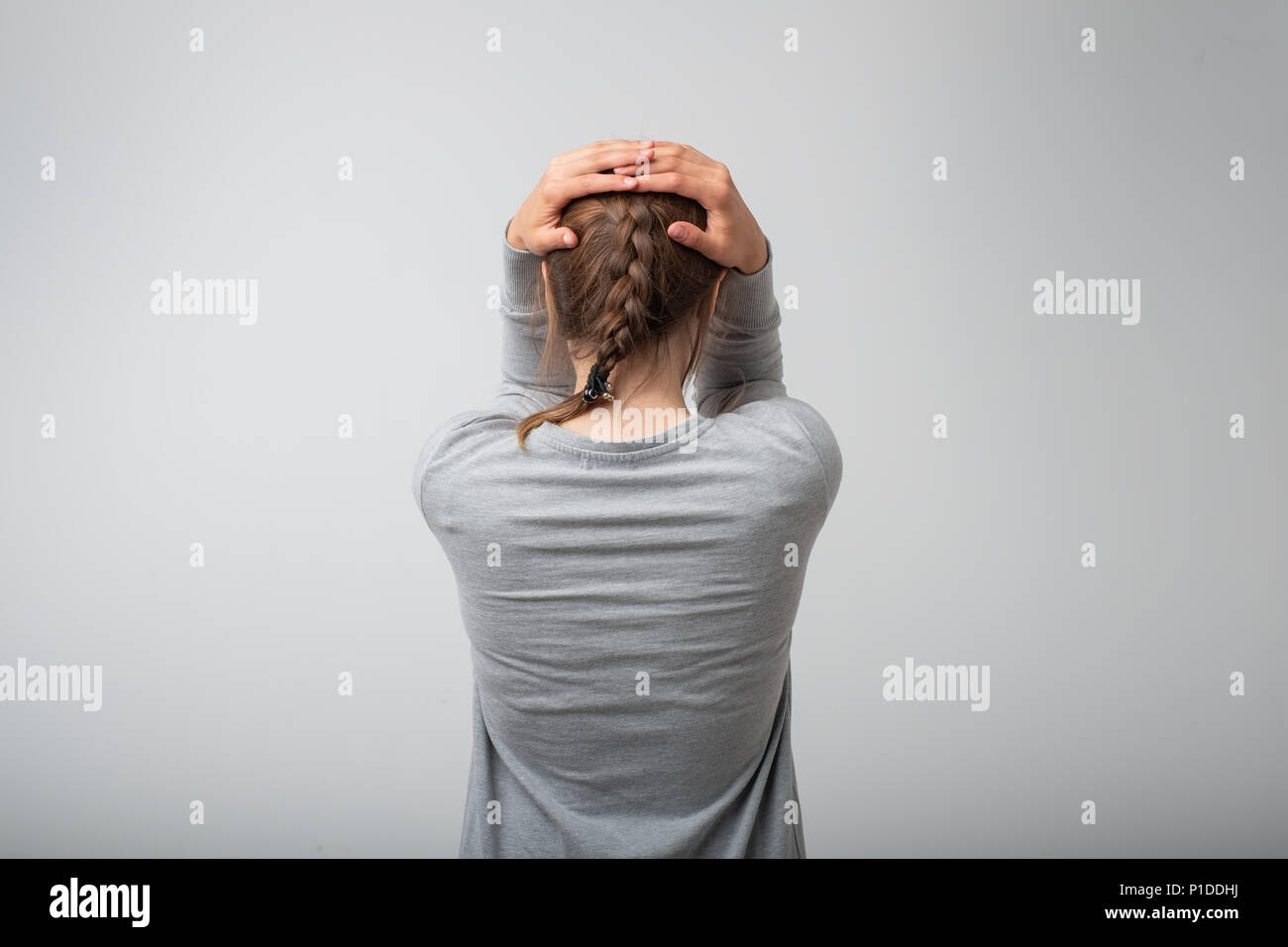 One back view crying hi-res stock photography and images - Alamy