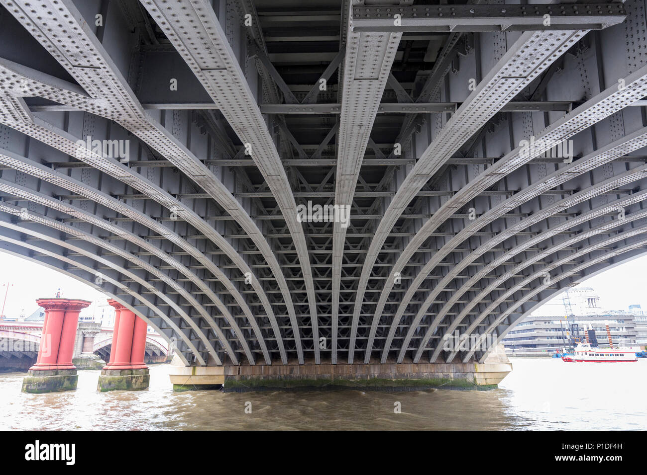 View underneath a bridge in downtown London Stock Photo - Alamy