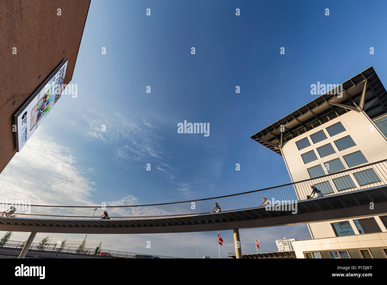 Two Danish flags under a bike path in Copenhagen, Denmark Stock Photo ...