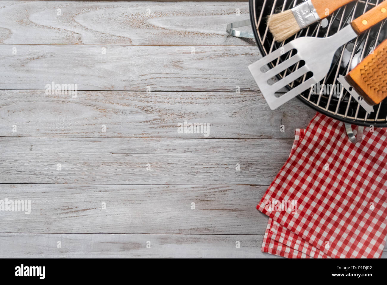 Background with BBQ cooking tools on wood background Stock Photo - Alamy