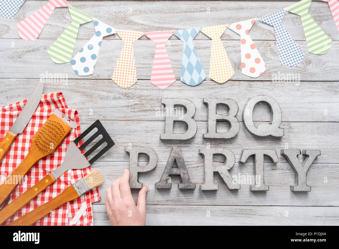 BBQ Party sign with BBQ cooking tools on a wood background Stock Photo ...