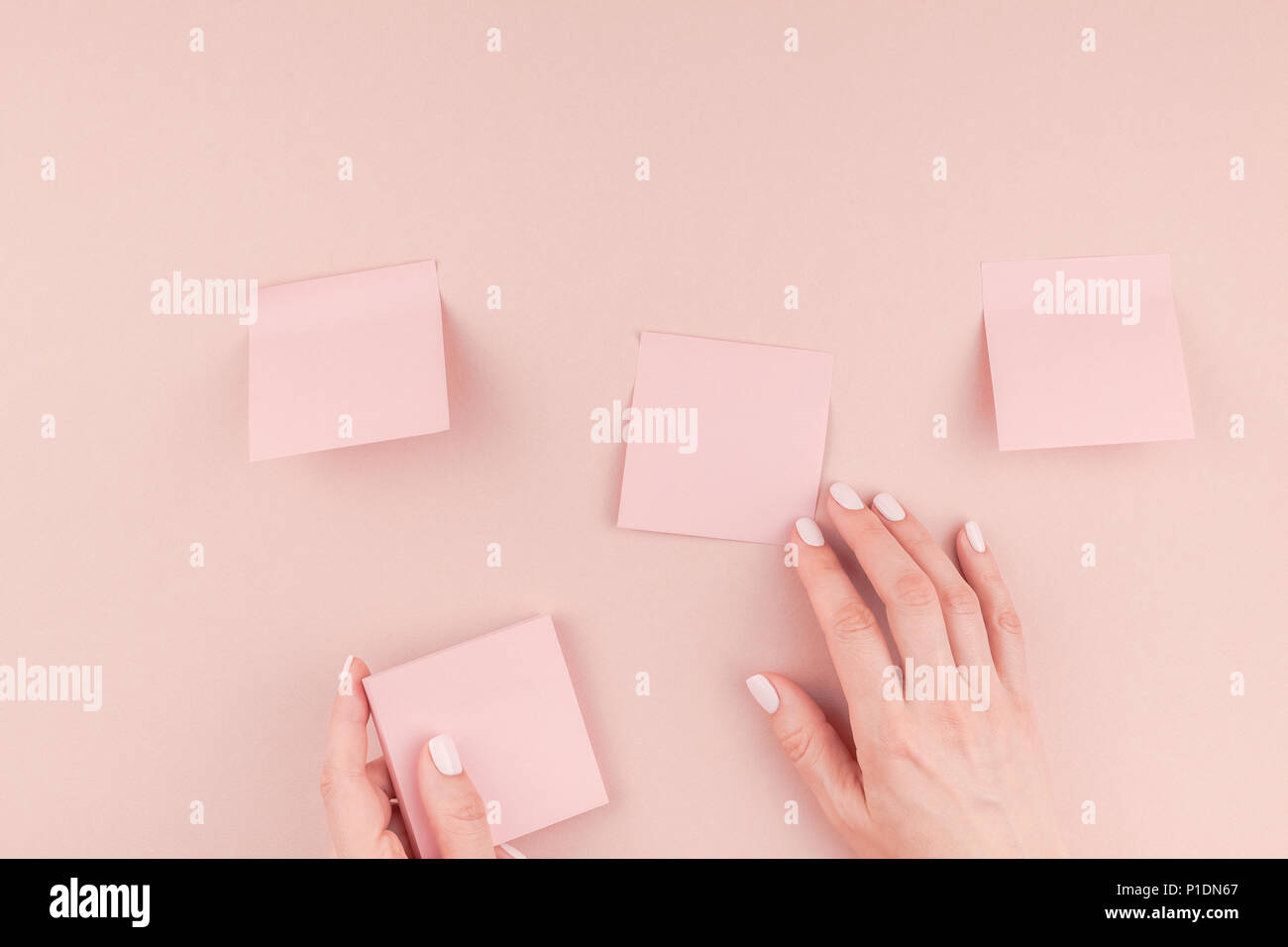 Creative flat lay photo of workspace desk with millennial pink sticker ...