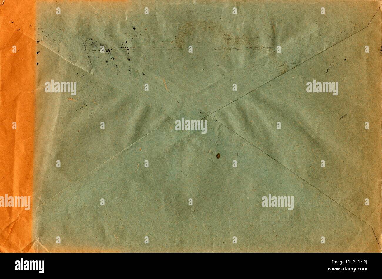 Back of an old used envelope. Rich stain and paper details. Can be used ...