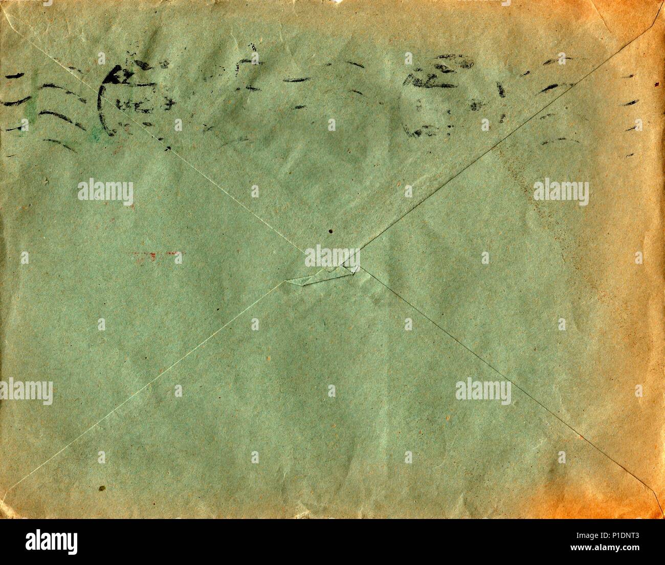 Back of an old used envelope. Rich stain and paper details. Can be used ...