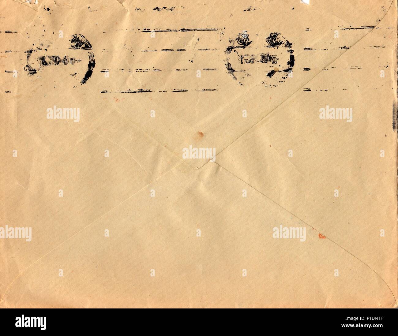 Back of an old used envelope. Rich stain and paper details. Can be used ...