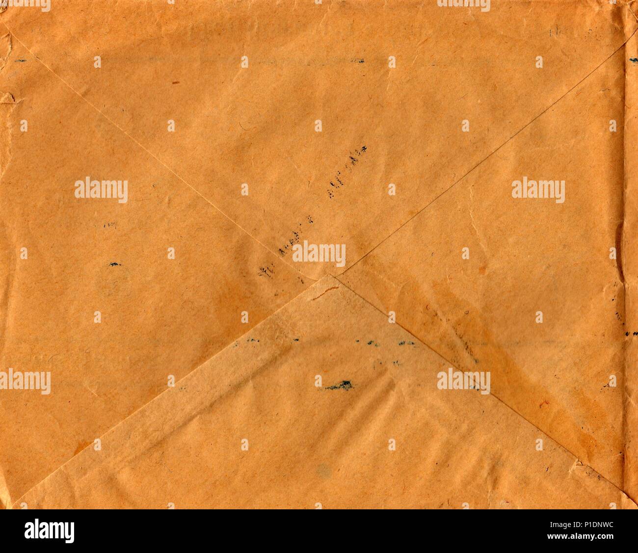 Back of an old used envelope. Rich stain and paper details. Can be used ...