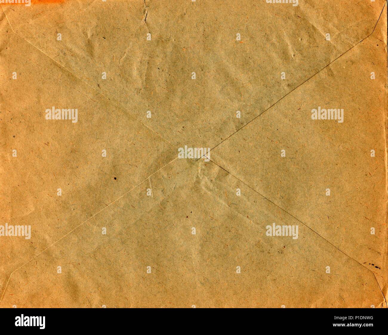 Back of an old used envelope. Rich stain and paper details. Can be used ...