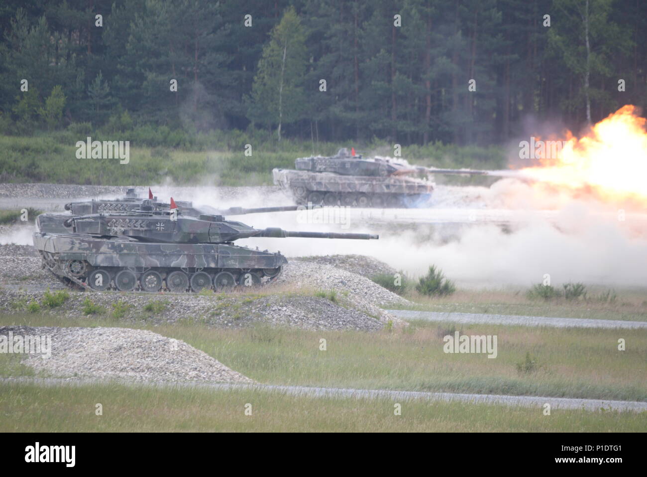 German soldiers, assigned to 3rd Panzer Battalion, engage targets ...