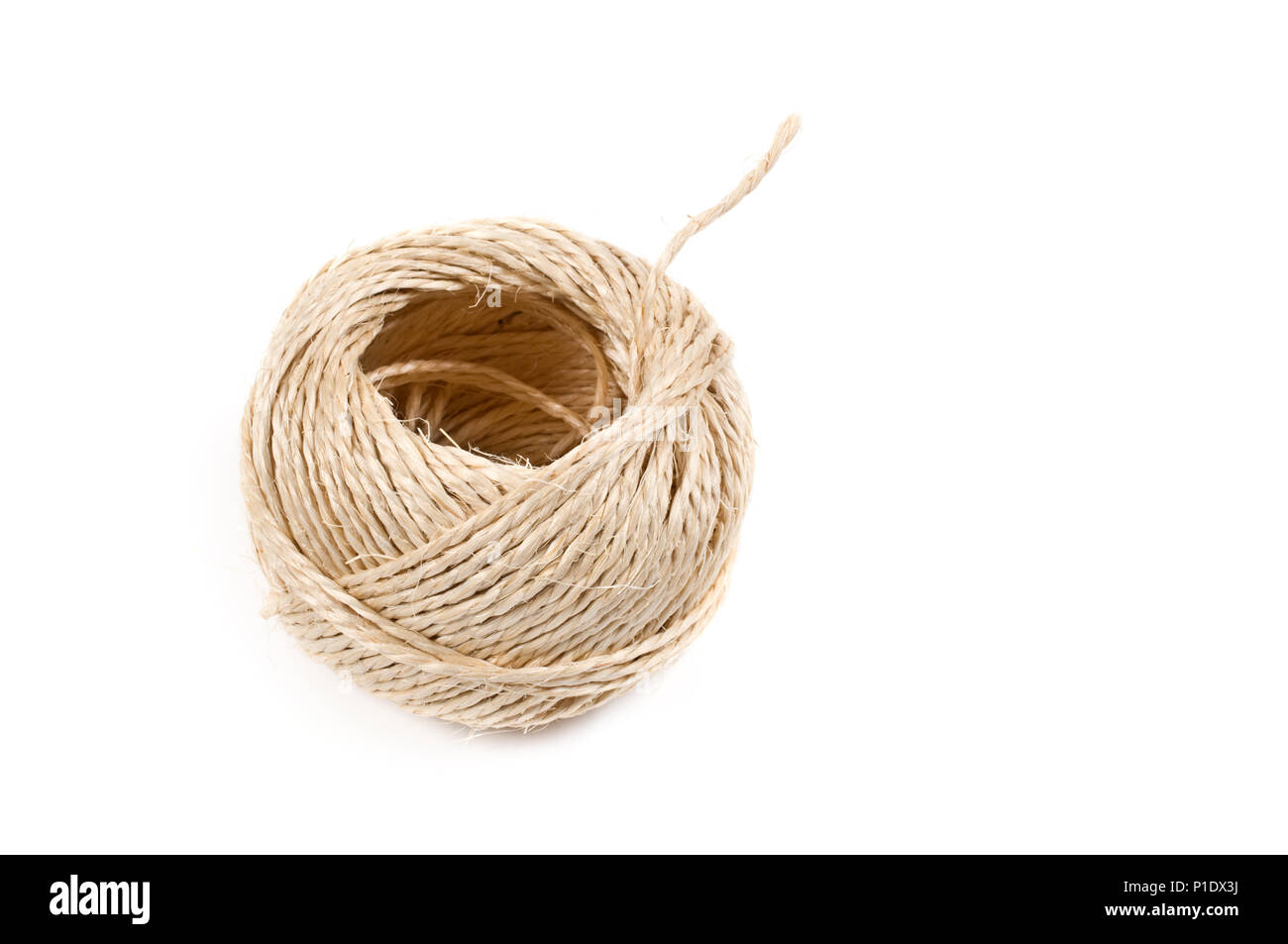 Clew of rope on white background Stock Photo - Alamy