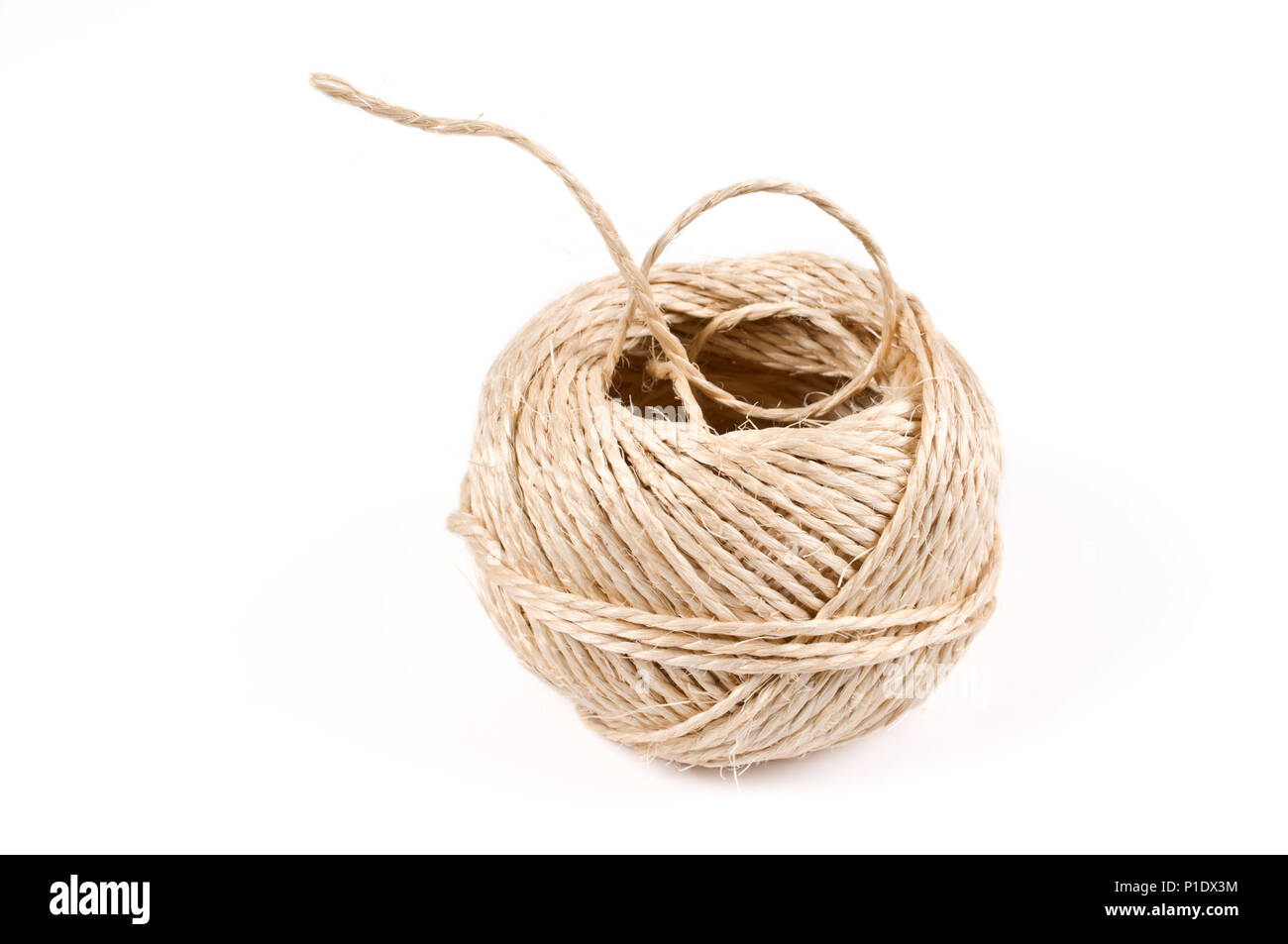 Clew of rope on white background Stock Photo - Alamy