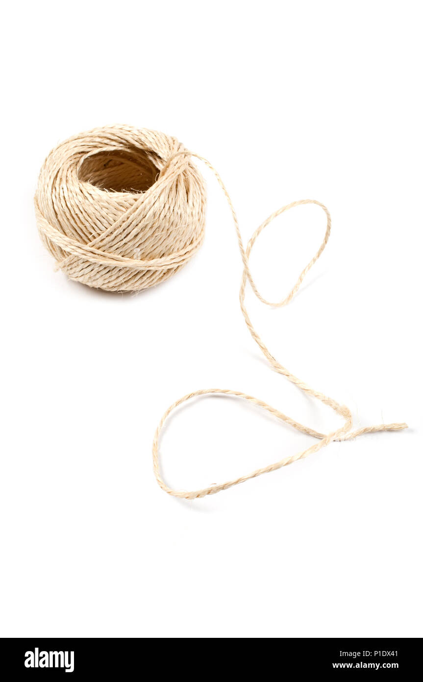 Clew of rope on white background Stock Photo - Alamy