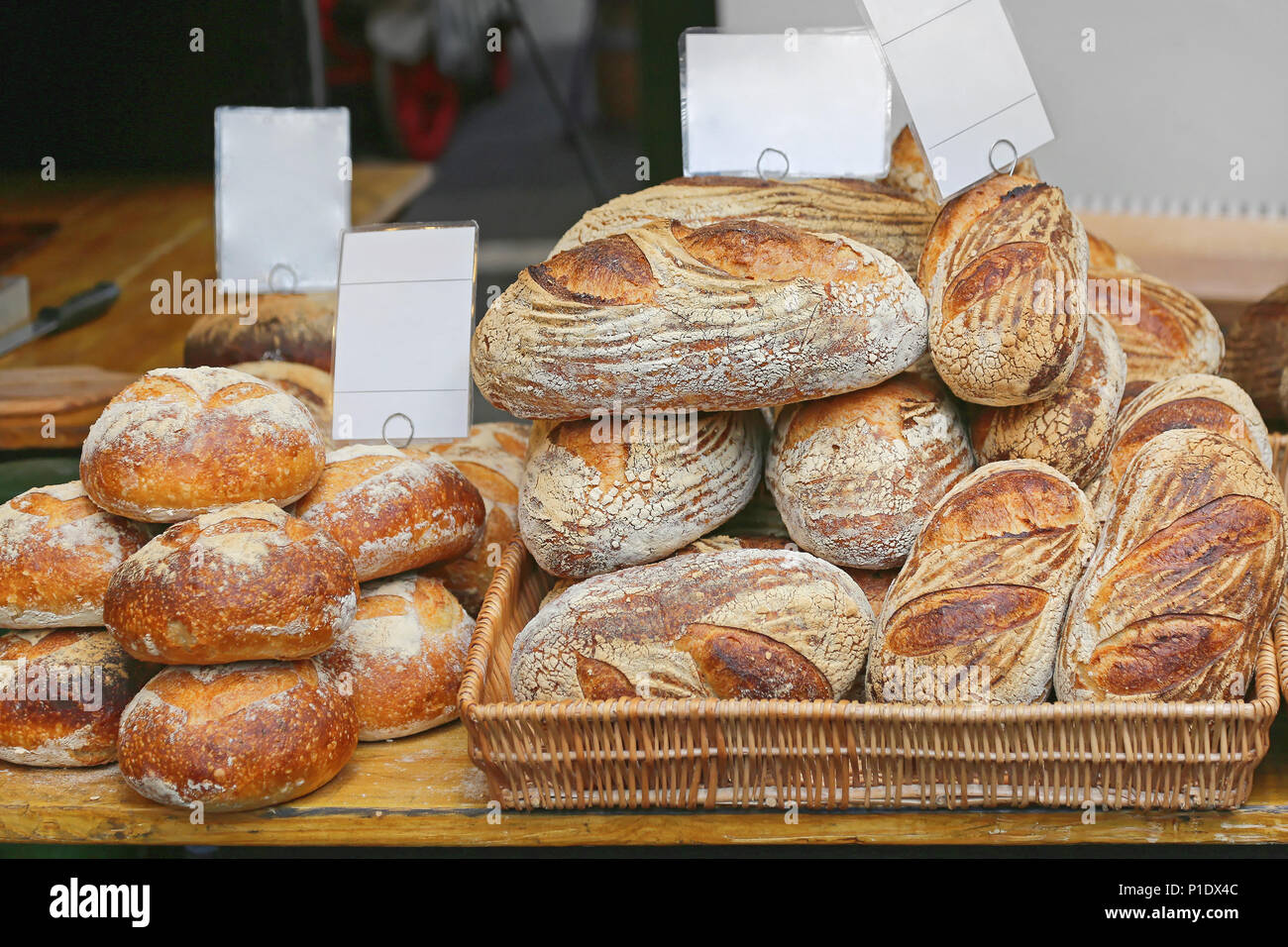 Loaves of Artisan Bread at Shelf in Bakery Stock Photo - Alamy