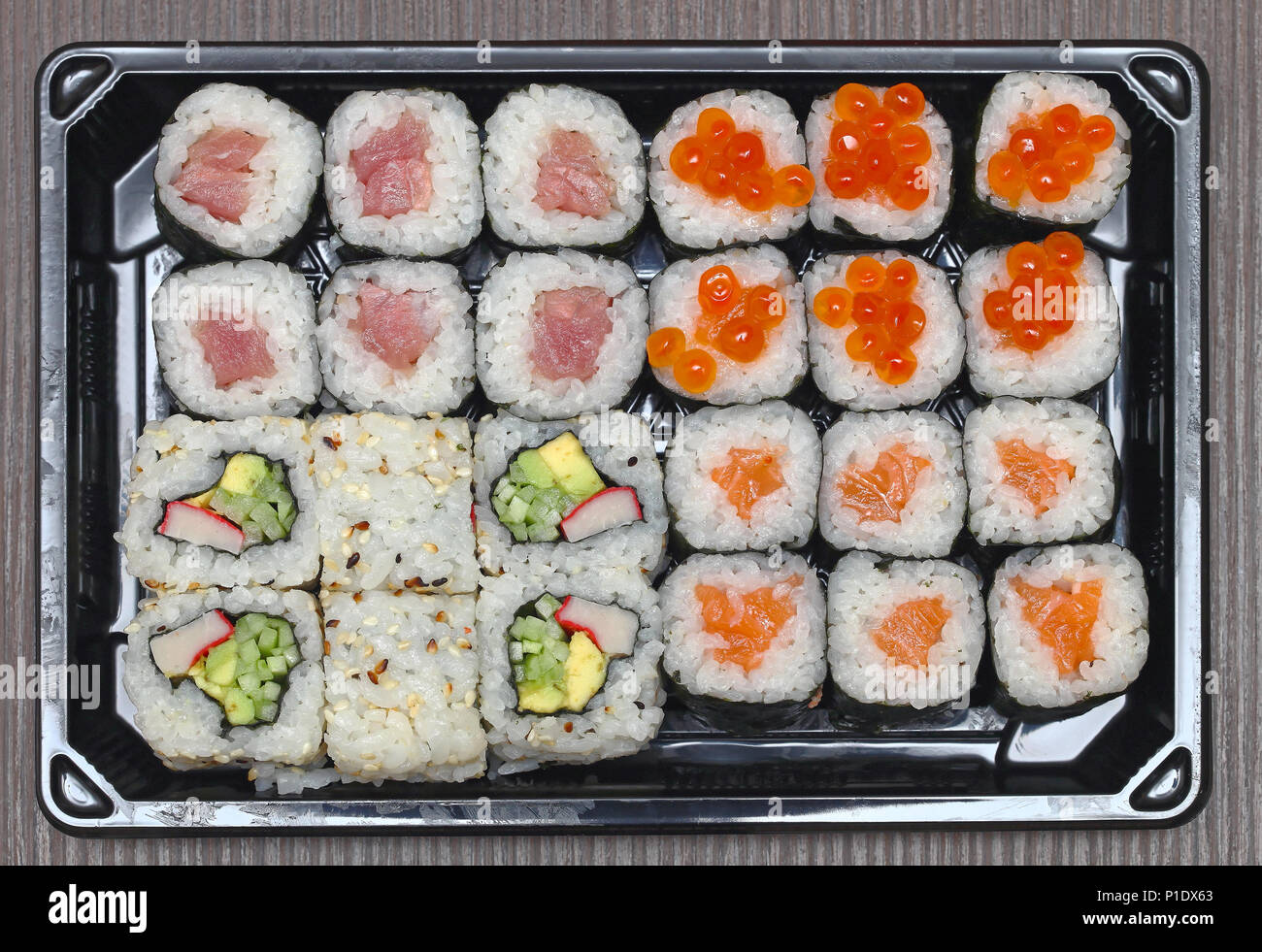 Sushi Rolls at Tray Traditional Japanese Cuisine Stock Photo - Alamy