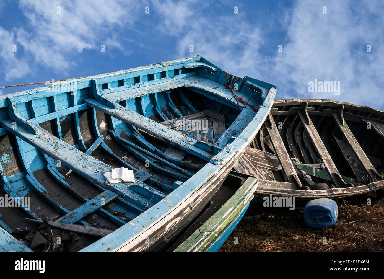 Small fishing boats used by illegal immigrants crossing from Africa to ...
