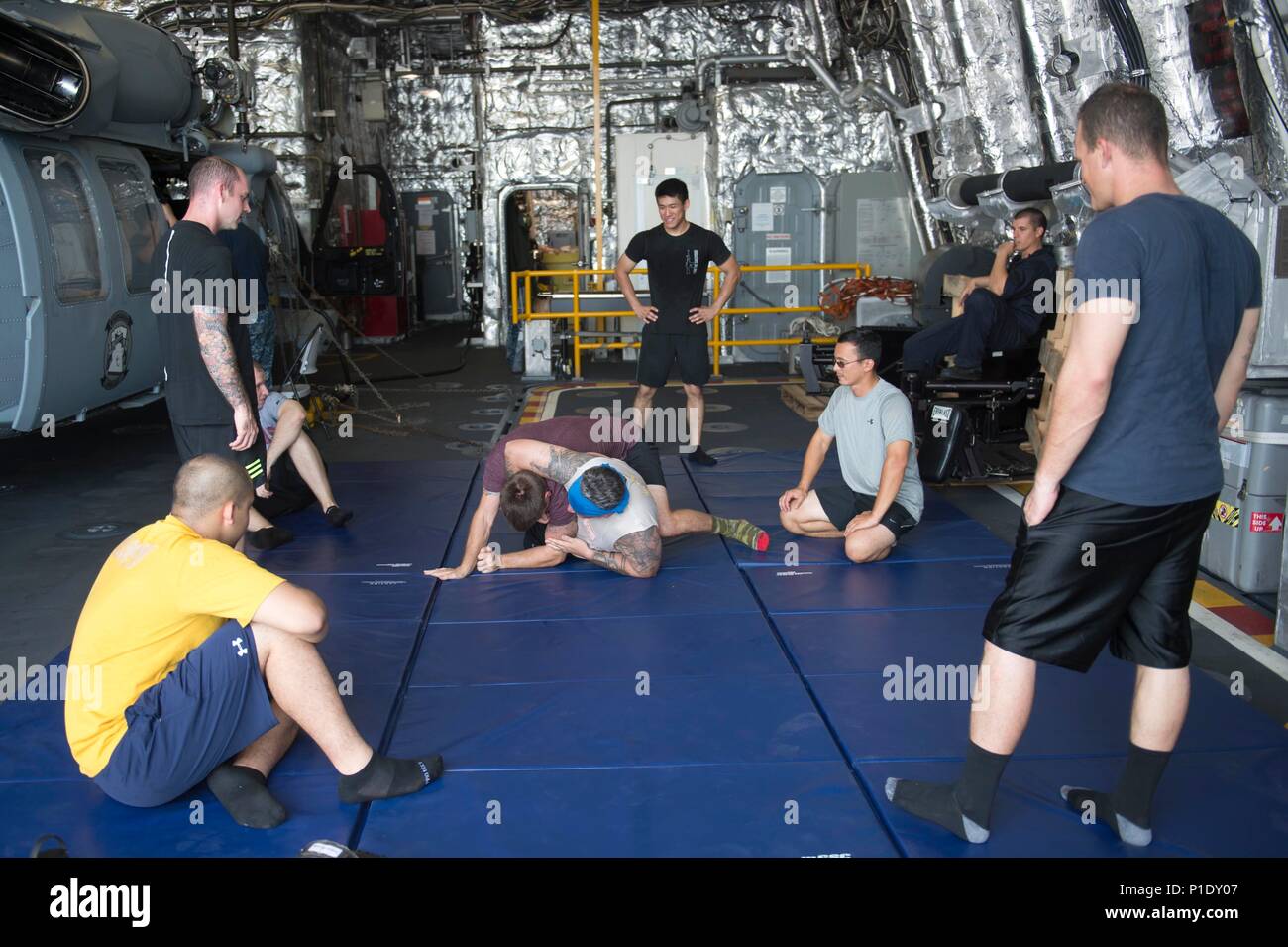 161018-N-MW990-164 CHANGI NAVAL BASE (October 18, 2016) Sailors ...