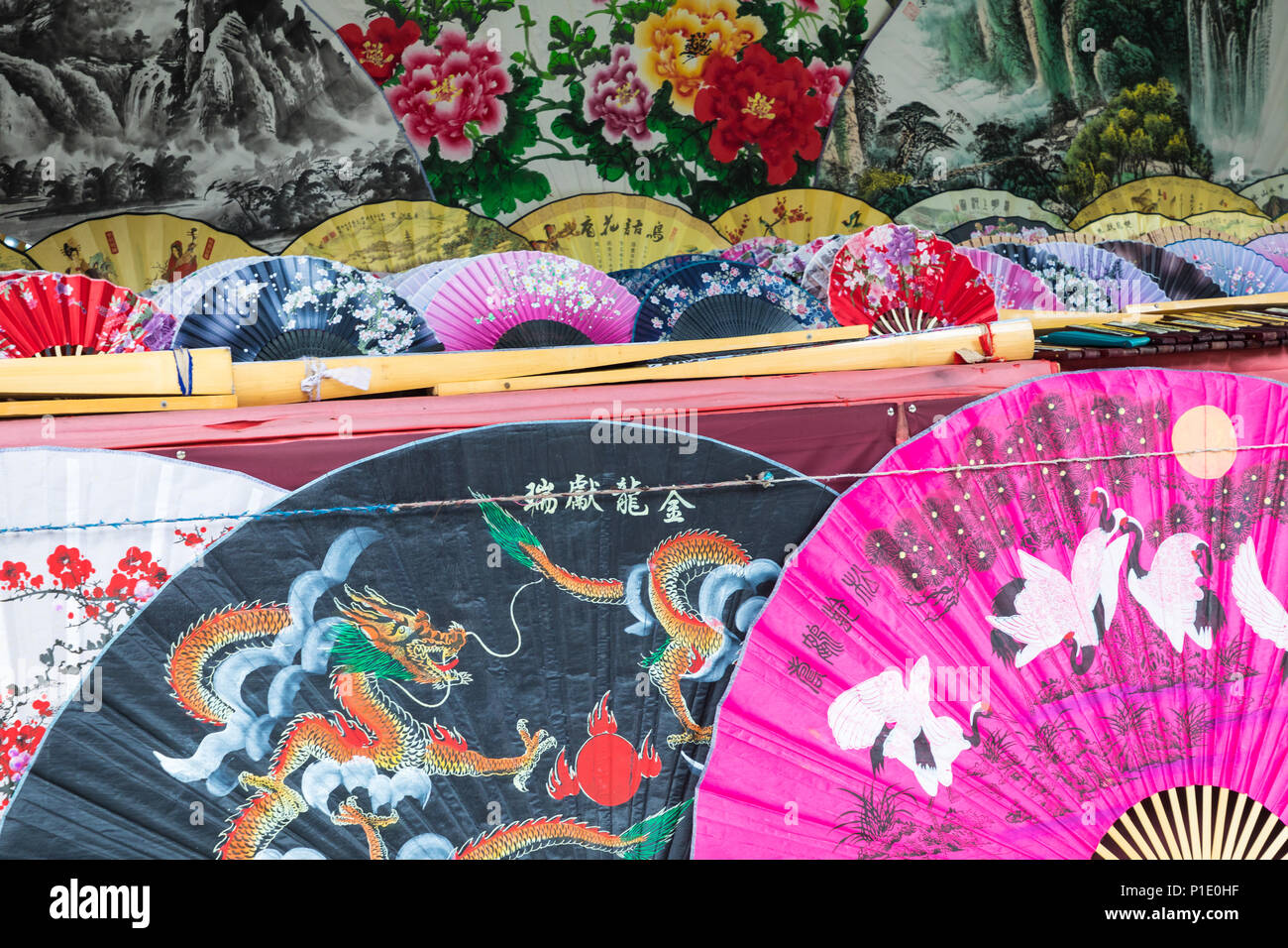 Traditional handicraft chinese fans at market in Yangshuo, China Stock ...