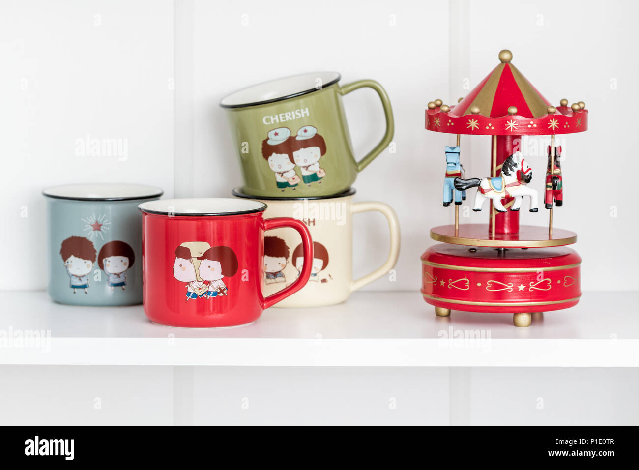 Teacup carousel hi-res stock photography and images - Alamy