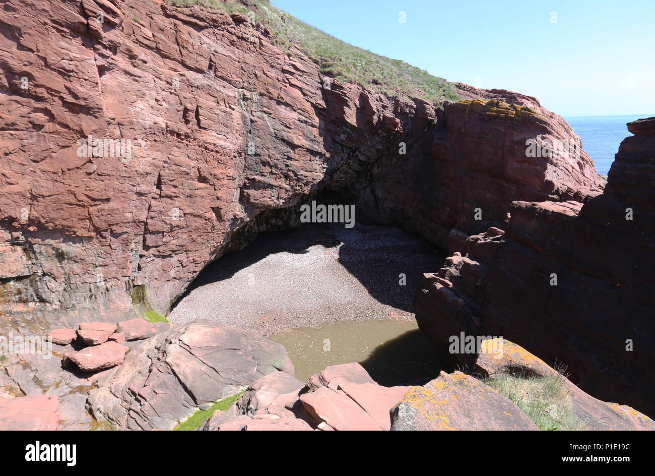 Small enclosed beach with cliff Seaton Cliffs Angus Scotland June 2018 ...