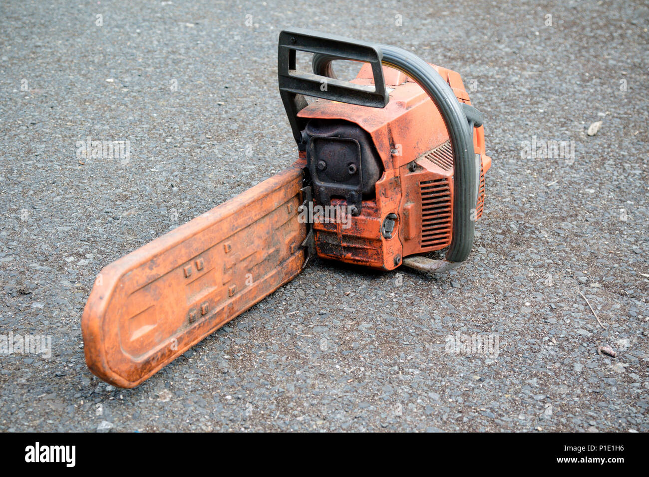 A well used chainsaw used by a tree surgeon Stock Photo - Alamy