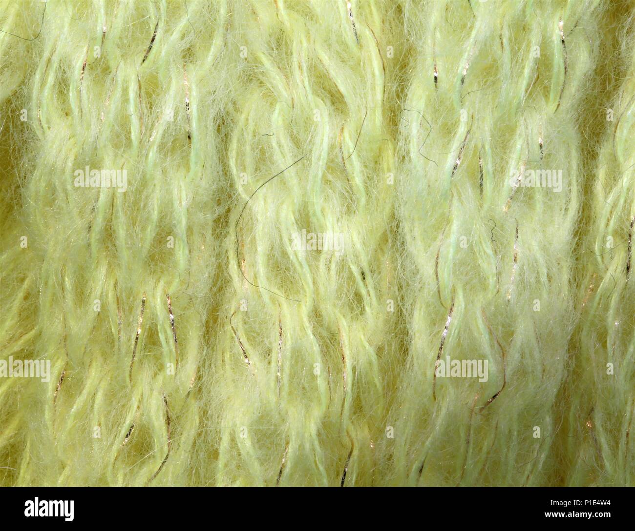 Abstract background of soft woven yellow wool with silver threads Stock ...