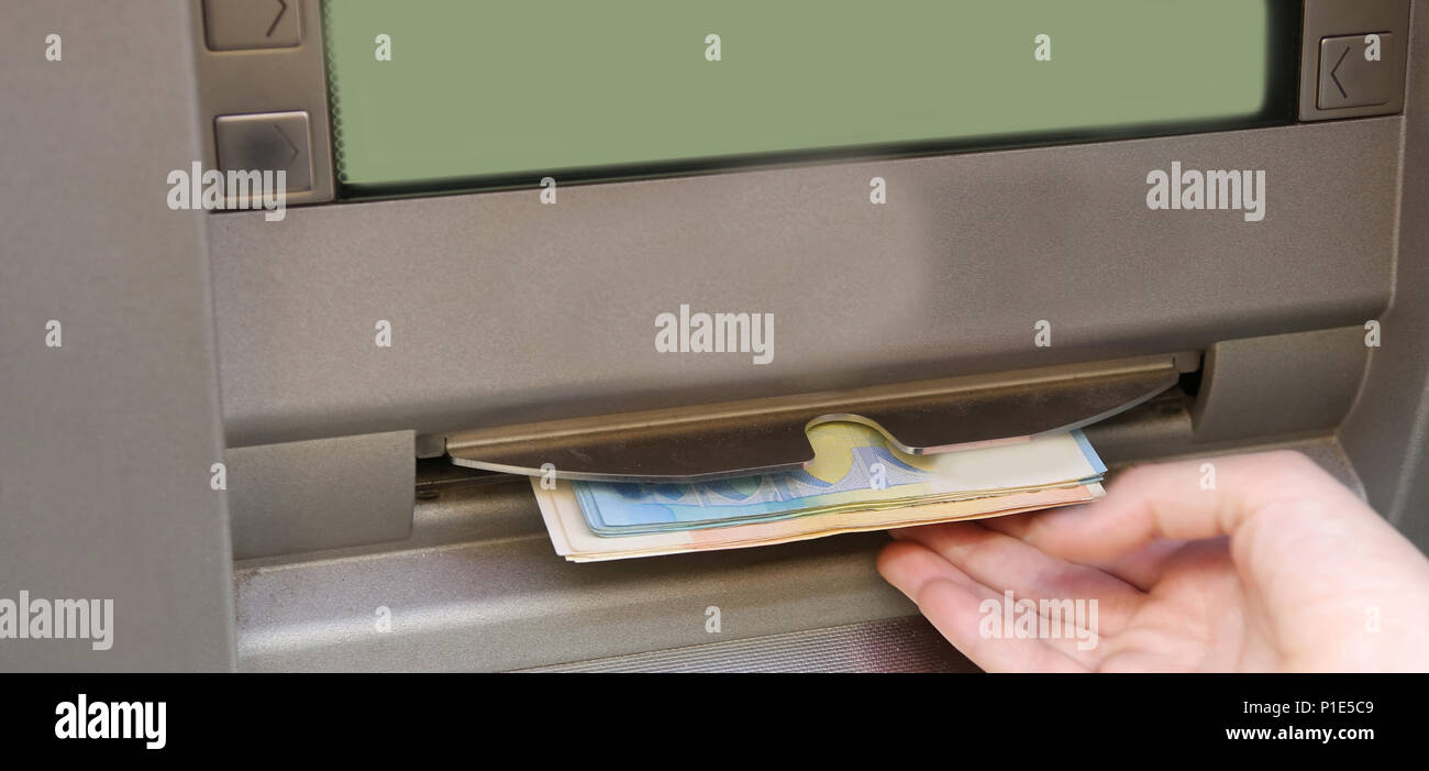 hand takes money at atm machine Stock Photo - Alamy