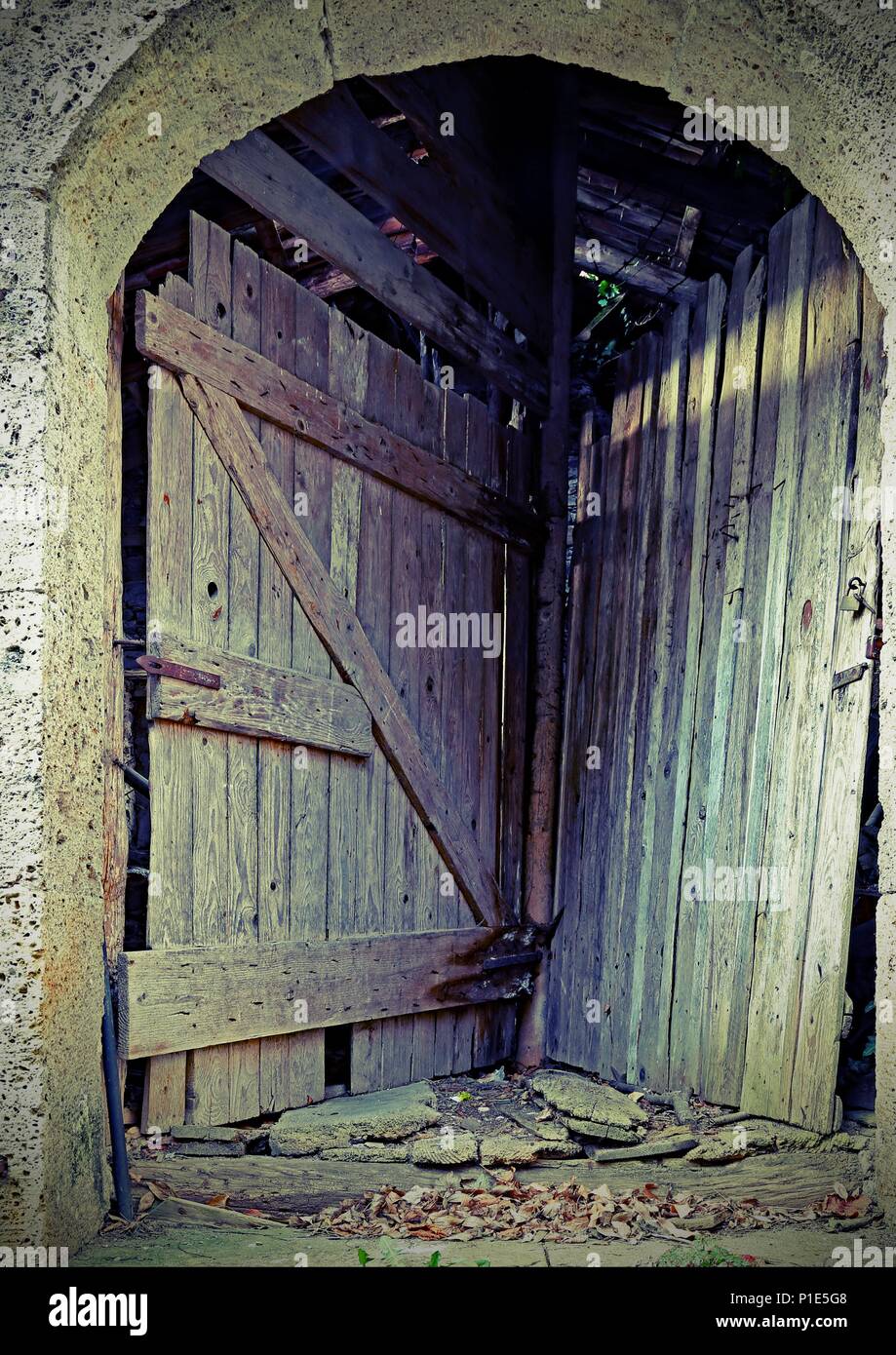 double door of a stable to access two different rooms using a single ...