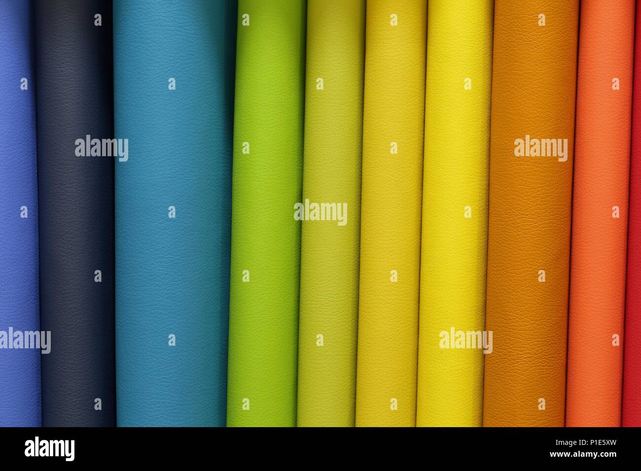 pieces of colored cloth for sale inside a tailor's shop Stock Photo - Alamy
