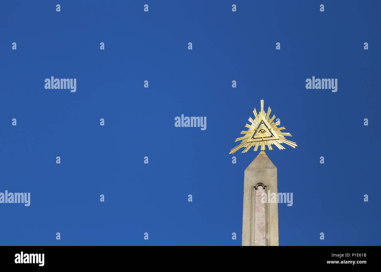Obelisk with above the golden eye of providence which is a symbol with ...