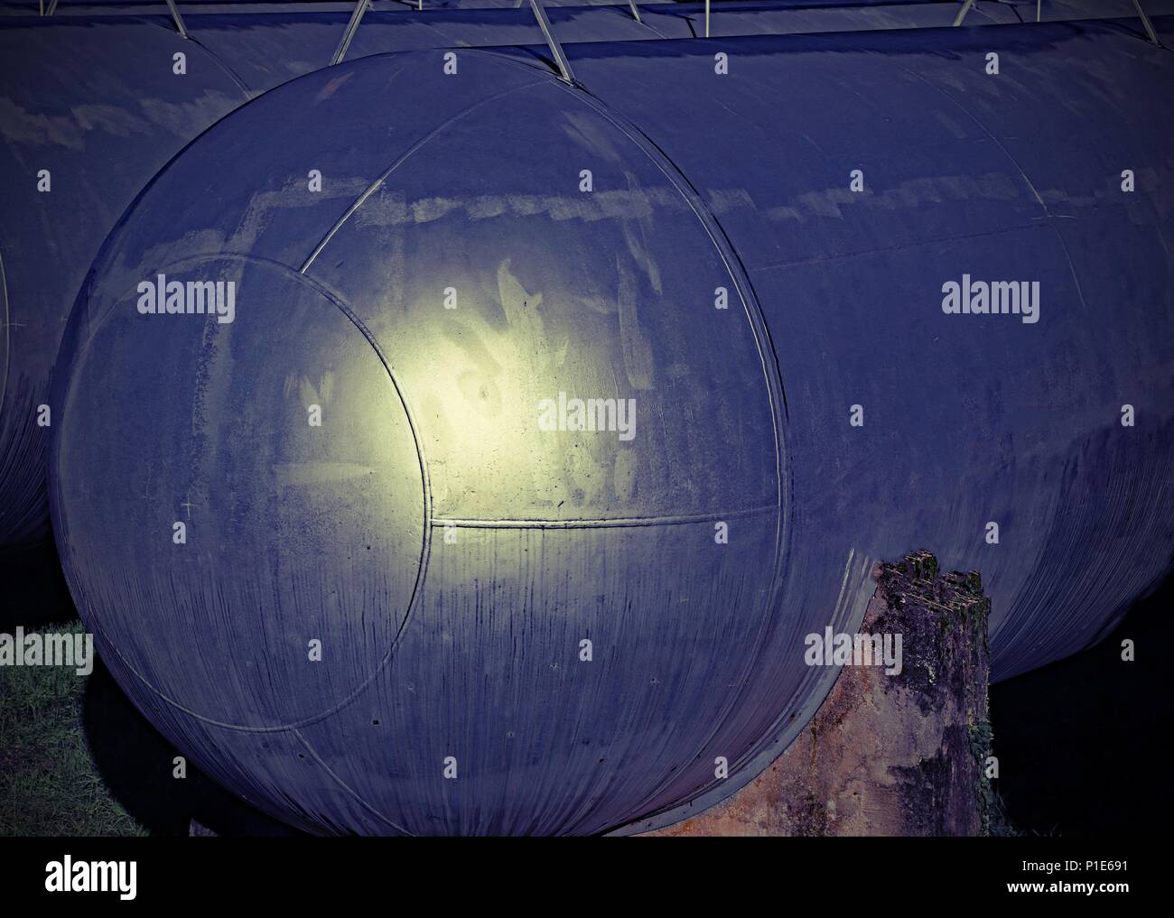 big tanks for the storage of natural gas in an industrial refinery with ...