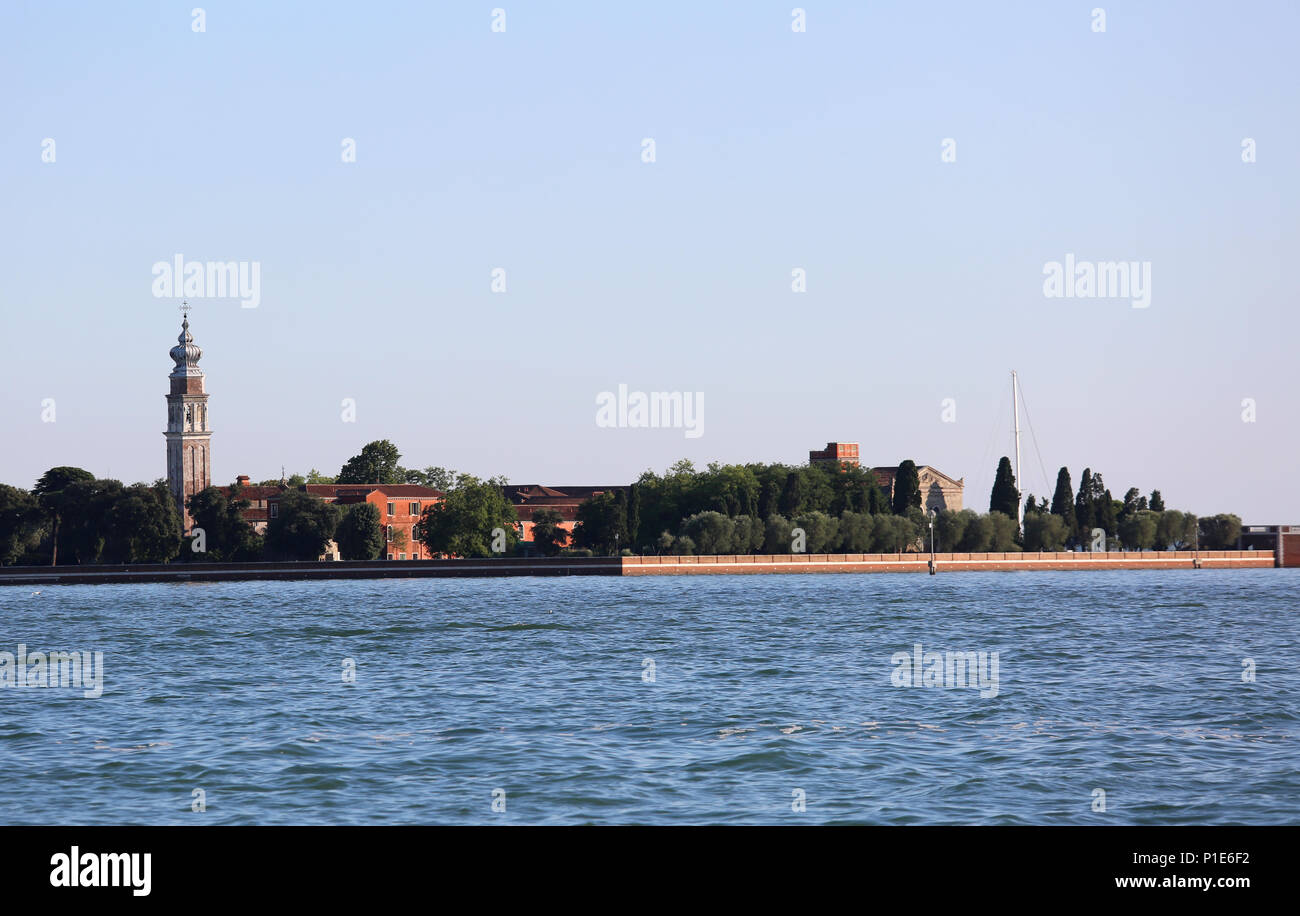 Venetian lagoon with the small island with the bell tower of the church ...