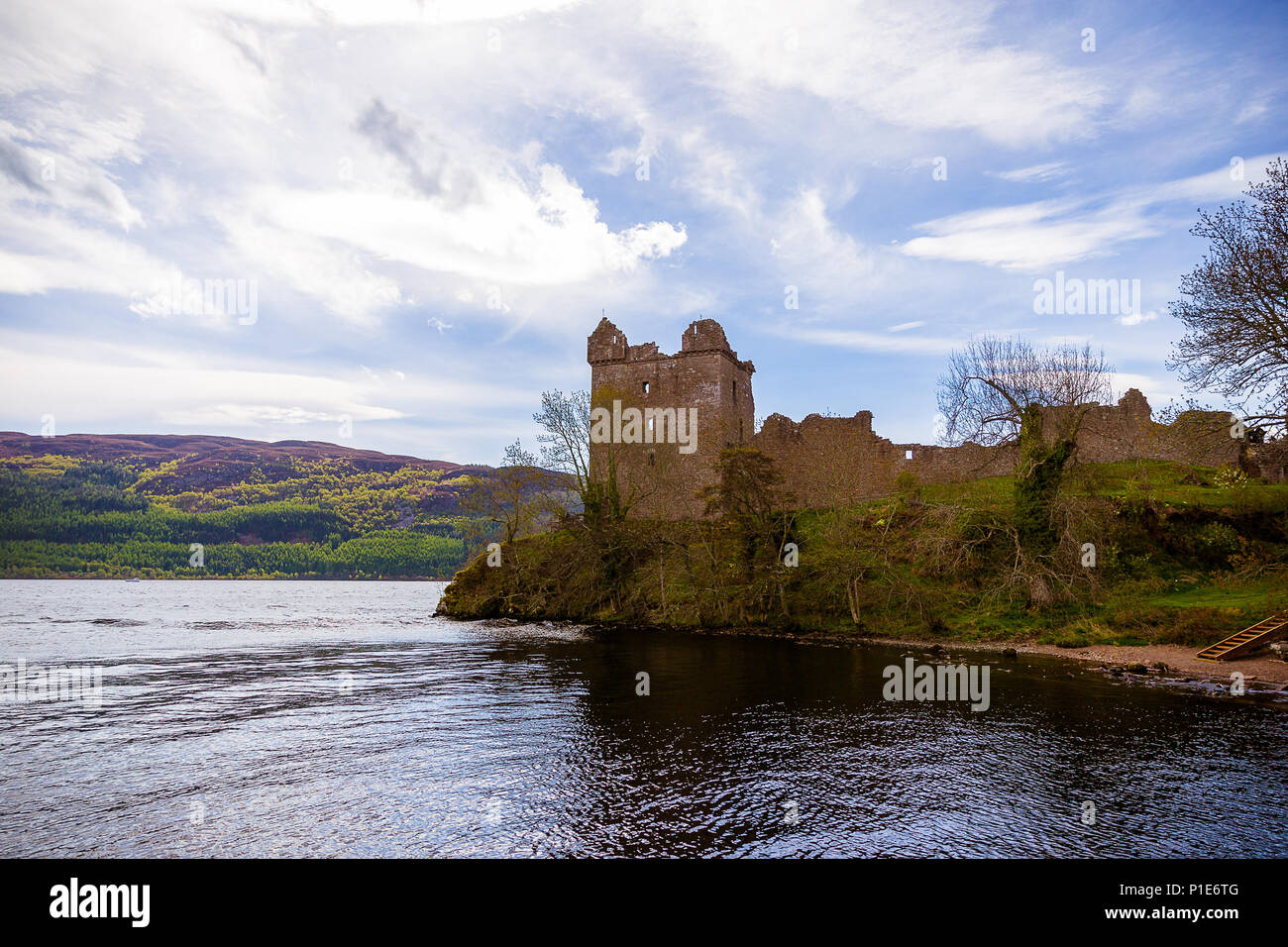 Scottish Castle overlooking a loch Stock Photo - Alamy