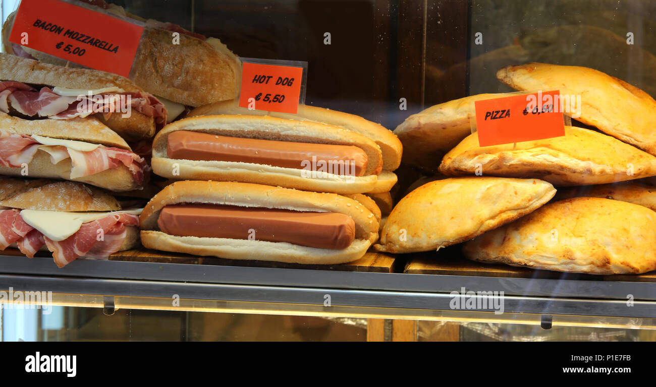 typical German sandwich stuffed with frankfurters for sale in a ...
