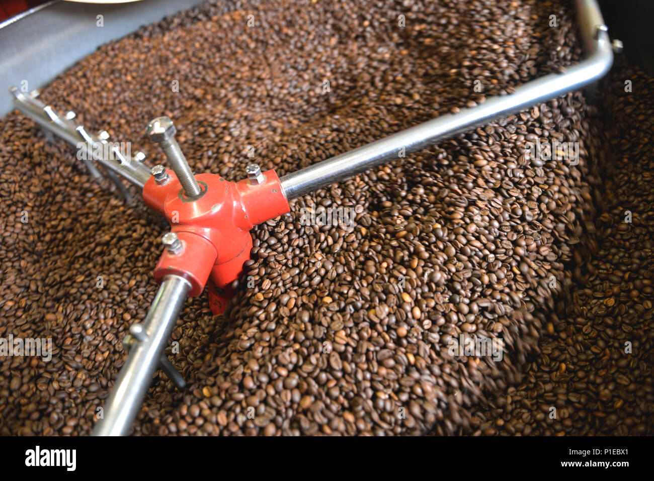 rotating toasting machine for coffee on a top view shot Stock Photo - Alamy