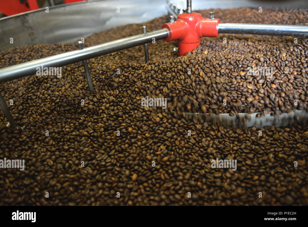 rotating toasting machine for coffee on a top view shot Stock Photo - Alamy