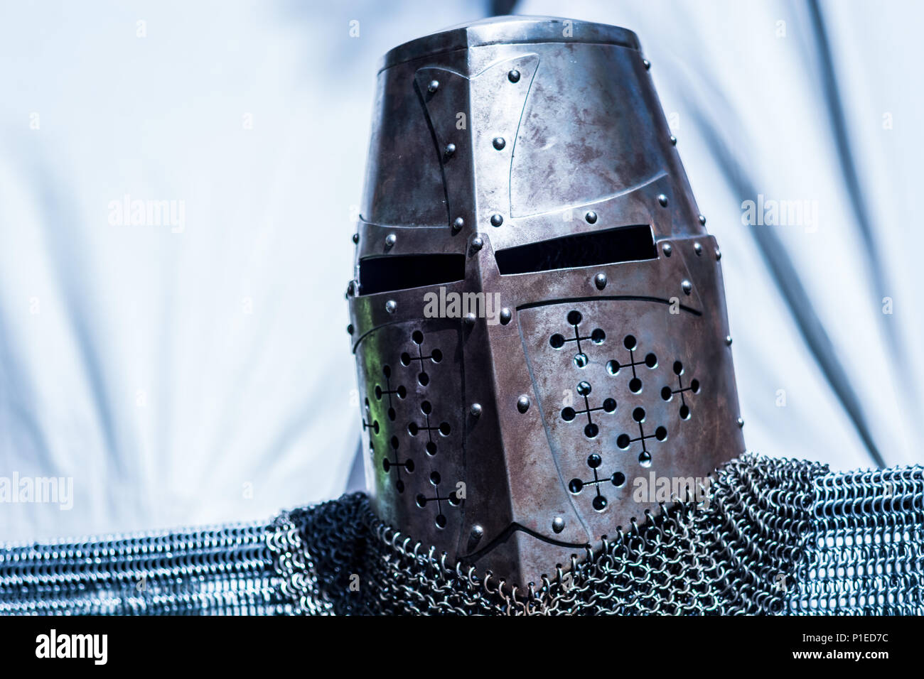 Medieval old knight helmet and chain mail for protection in battle ...