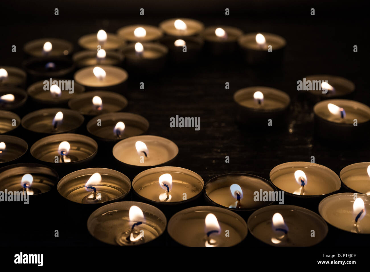 Symbols of Islam. Candle lights on black background. Abstract isolated ...