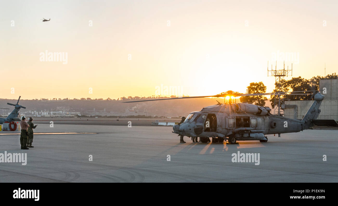 Aircrew assigned to Helicopter Sea Combat Squadron (HSC) 85 prepare to ...